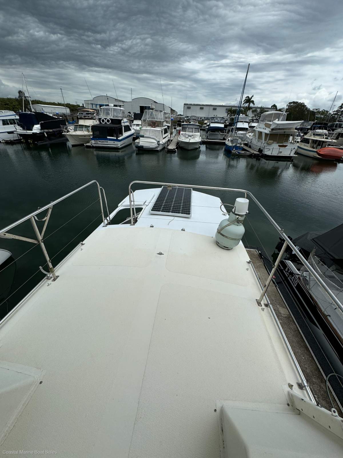 Aquarius 35 Flybridge Cruiser For Sale | Coastal Marine Boat Sales